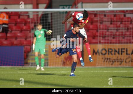 Gary Madine #14 of Blackpool heads at goal during the Sky Bet ...