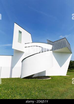 White modern building of towers, ramps and cubes, Vitra Design Museum ...