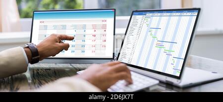 Gantt Schedule Plan On Laptop Screen In Office Stock Photo - Alamy