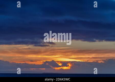 The disappeared behind some cloud cover Stock Photo - Alamy