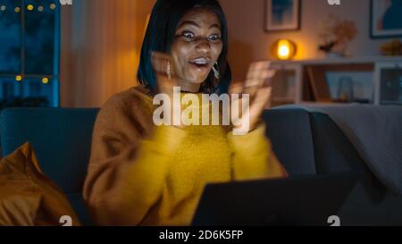 Celebrating Joy at Home While Listening to Music in Cozy Living Room ...