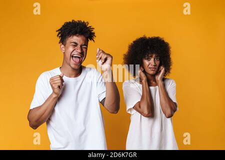 Displeased african american woman plugging her nose, smells something ...