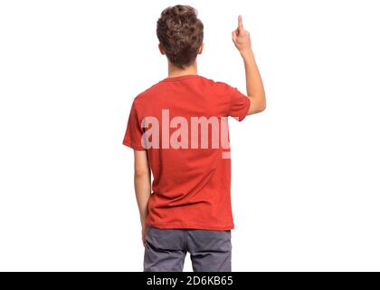 Back view. Teen boy pointing finger away at copyspace, isolated on ...