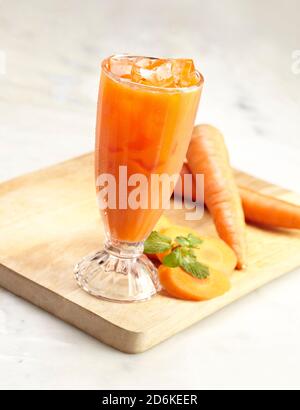 Carrot Juice on Ice Stock Photo - Alamy