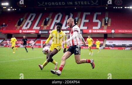 Sheffield United's Oliver McBurnie (right) celebrates scoring his side ...