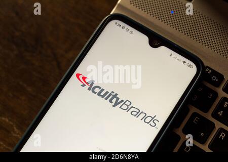 In this photo illustration, Acuity Brands logo is seen on a smartphone ...