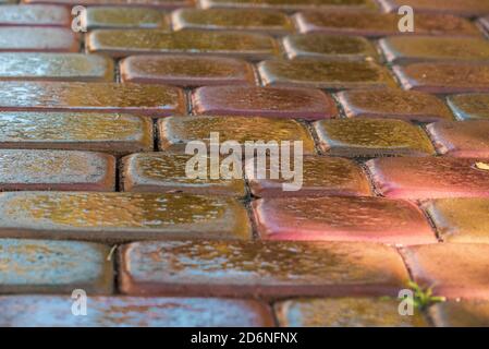 pink paving slab after rain for background Stock Photo - Alamy