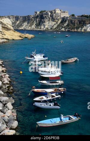 Tremiti islands with blue water, boats and clouds. Gargano. Puglia. for ...