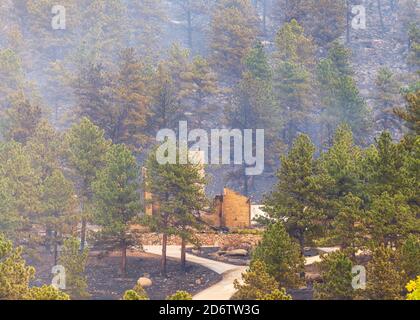 Houses burned to the ground and destroyed after a wildfire burned ...
