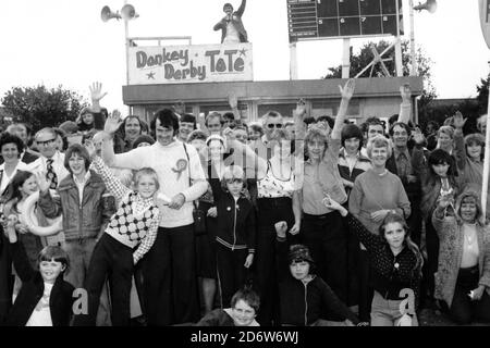 Holidaymakers and a Redcoat at Butlin's holiday camp Stock Photo - Alamy