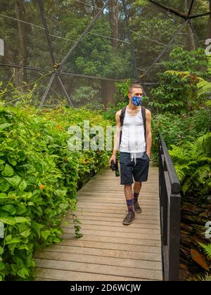 Caucasian Blond Man Wearing a Handcraft Face Mask Stock Photo - Alamy