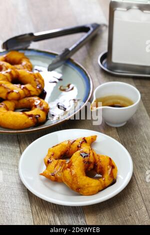 picarones, peruvian pumpkin doughnuts Stock Photo - Alamy