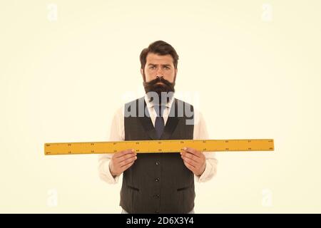 Measuring a line. back to school. bearded man hold ruler isolated on ...