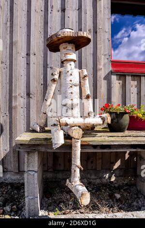 Closeup of a Wooden Puppet made by Tree Trunk Stock Photo - Alamy