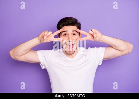 Photo of excited crazy person toothy smile direct fingers up empty ...