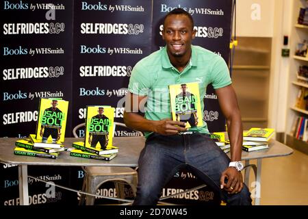 Usain Bolt pictured at Selfridge's in London, as he signs copies of his ...