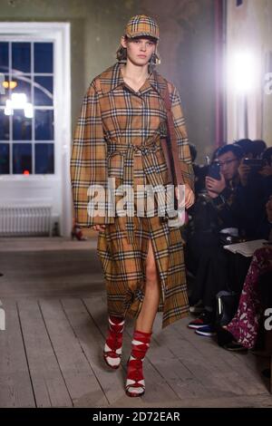 Model Cara Taylor walking on the runway during the Moschino Fashion ...