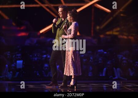 EDITORIAL USE ONLY. Damian Lewis and Anna Friel on stage at the Brit ...