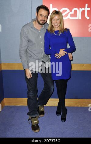 Amanda Holden poses for photographs with Jamie Theakston, after ...