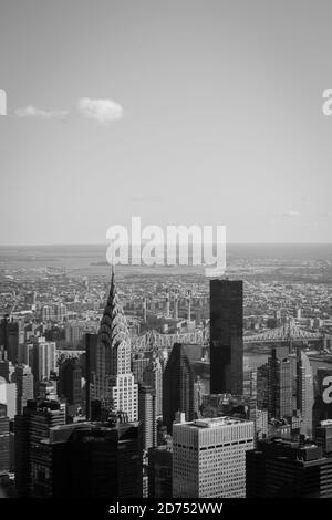 A vertical grayscale shot of the NYC skyline at night Stock Photo - Alamy