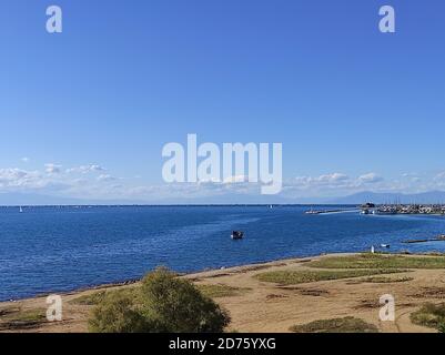 Sunny clear calm blue sea shore beach. Summer sea idyllic travel on ...