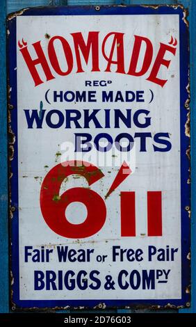 Advertising sign for boots made with leather Stock Photo - Alamy