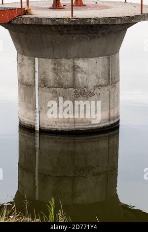 Water level depth meter ruler and its reflection on water Stock Photo ...