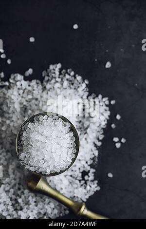 Large sea salt. Spice. Mortar and pestle for grinding salt Stock Photo ...