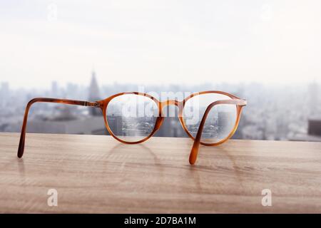 Glasses that correct eyesight from blurred to sharp Stock Photo - Alamy