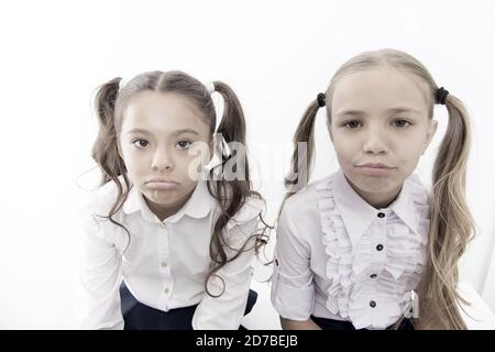 Smart cuties. School children in science classroom. Microscope and ...