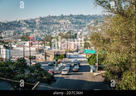 View of poor area of Tijuana Mexico with buildings on hill Stock Photo ...