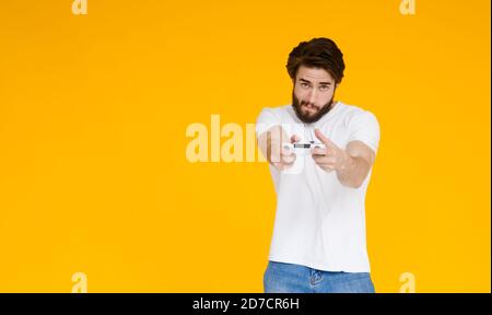 Portrait of his he nice attractive glad cheerful cheery guy throwing ...