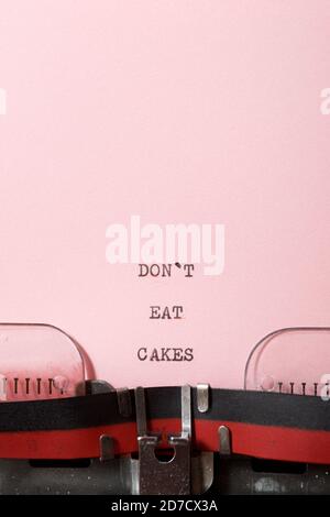 Don´t eat cakes phrase written with a typewriter Stock Photo - Alamy