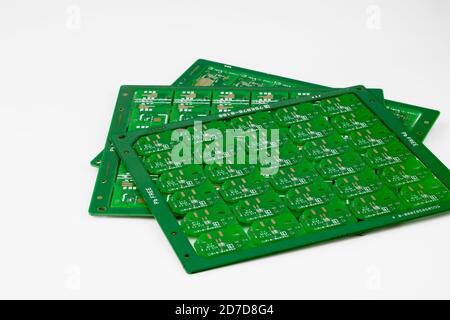Multiplied printed circuit boards PCB isolated on the white background. PCB assembly Stock Photo ...