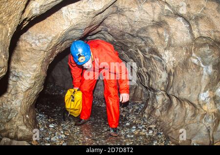 A caver in Kingsdale Master cave, Yorkshire Dales, UK Stock Photo - Alamy