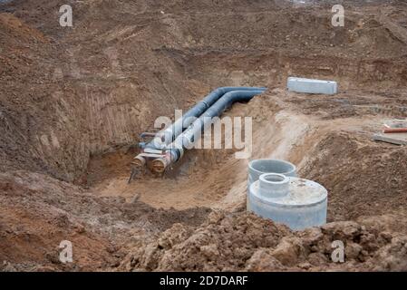 Connecting a trench drain to a concrete manhole structure at ...