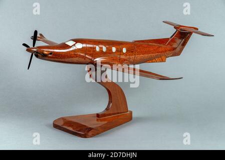 Wooden airplane model side view isolated Stock Photo - Alamy