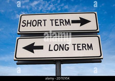 Road sign with short and long term word, 3d rendering Stock Photo - Alamy