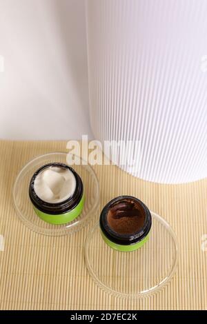 Opened glass cream pot with copy space for your brand isolated on ...