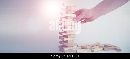 Board game brick tower of light wood sticks Stock Photo - Alamy
