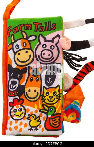 Young child's Farm Tails fabric book set on white background Stock ...