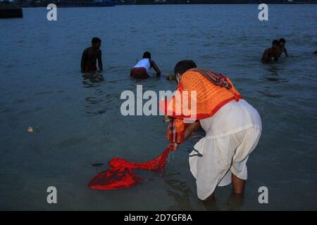 One of the first rituals of durga puja is the "Kola Bou Snan". She is ...