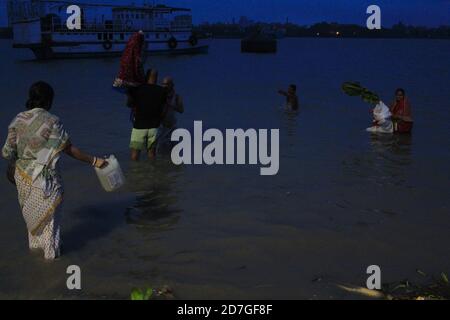 One of the first rituals of durga puja is the "Kola Bou Snan". She is ...
