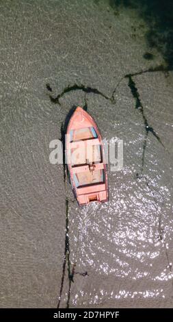 An aerial view of an old wooden boat flowing through the waves Stock ...