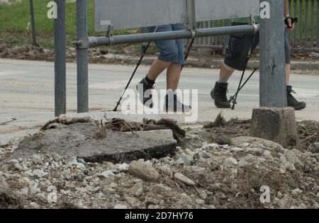 storm damage caused by mudslides, debris and mud after heavy rainfalls ...