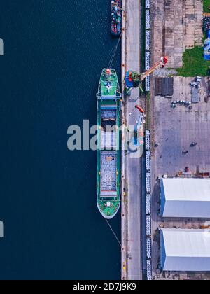 Russia, Primorsky Krai, Zarubino, Aerial view of container ship moored ...