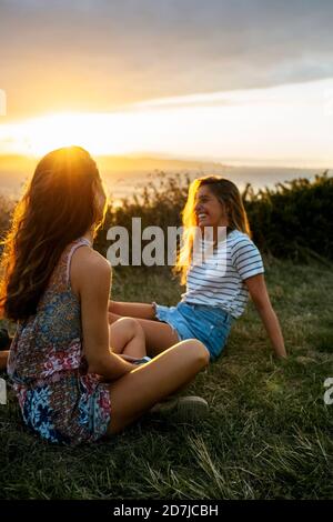 Happy young family spending time together outside in green nature Stock ...