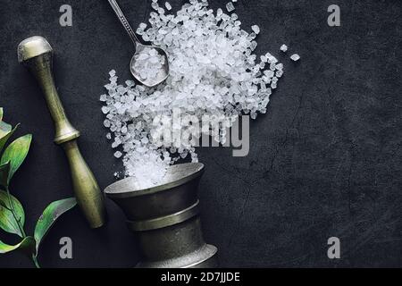 Large sea salt. Spice. Mortar and pestle for grinding salt Stock Photo ...