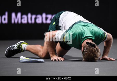 Alejandro Davidovich Fokina of Spain lies on the grass after falling ...