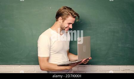 Student learn programming language. Handsome man use modern technology ...